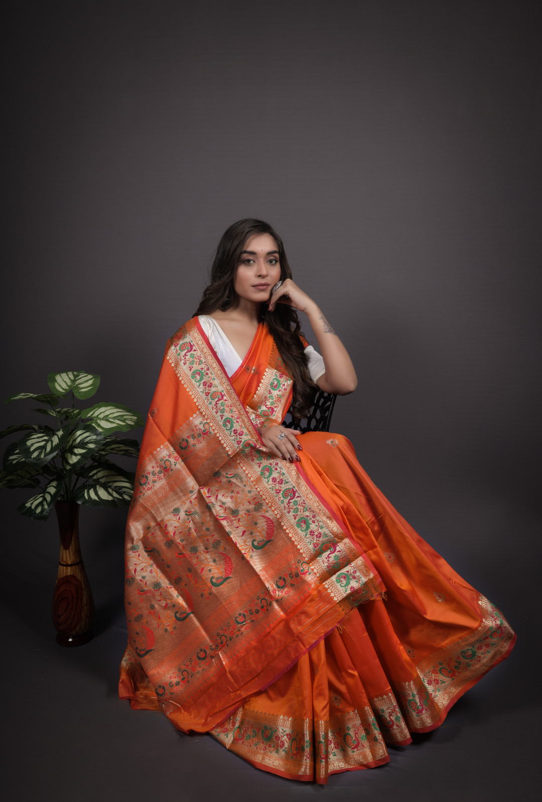 Orange color paithani silk saree with zari weaving work