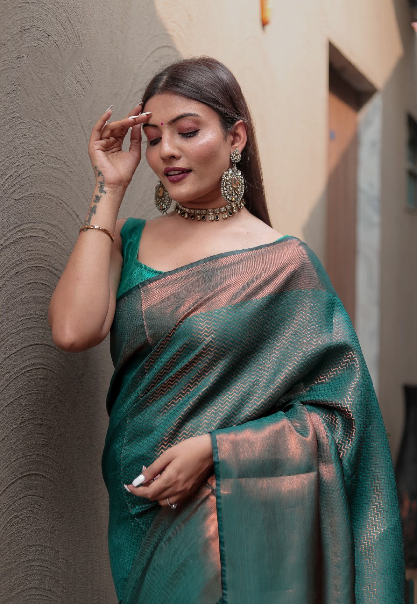 Rama green color kanchipuram silk saree with zari woven work