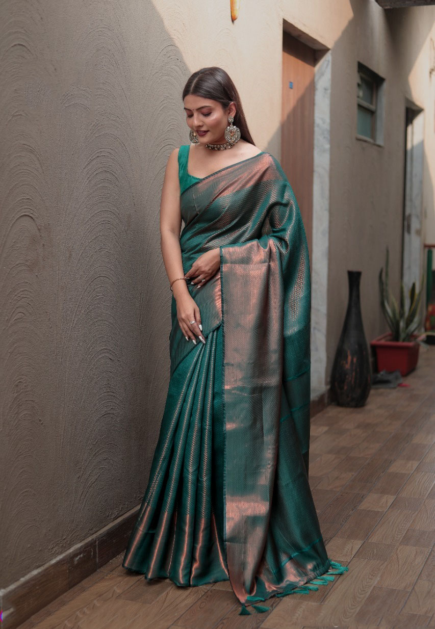 Rama green color kanchipuram silk saree with zari woven work