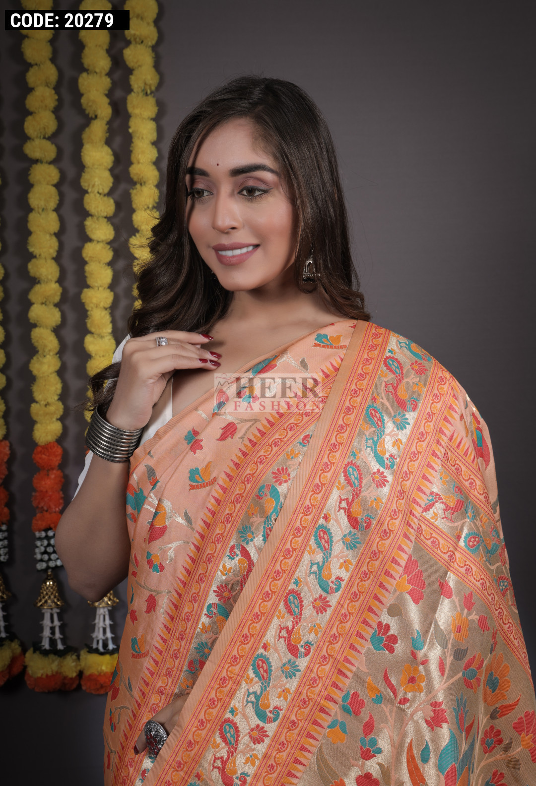 Peach color paithani silk saree with zari weaving work