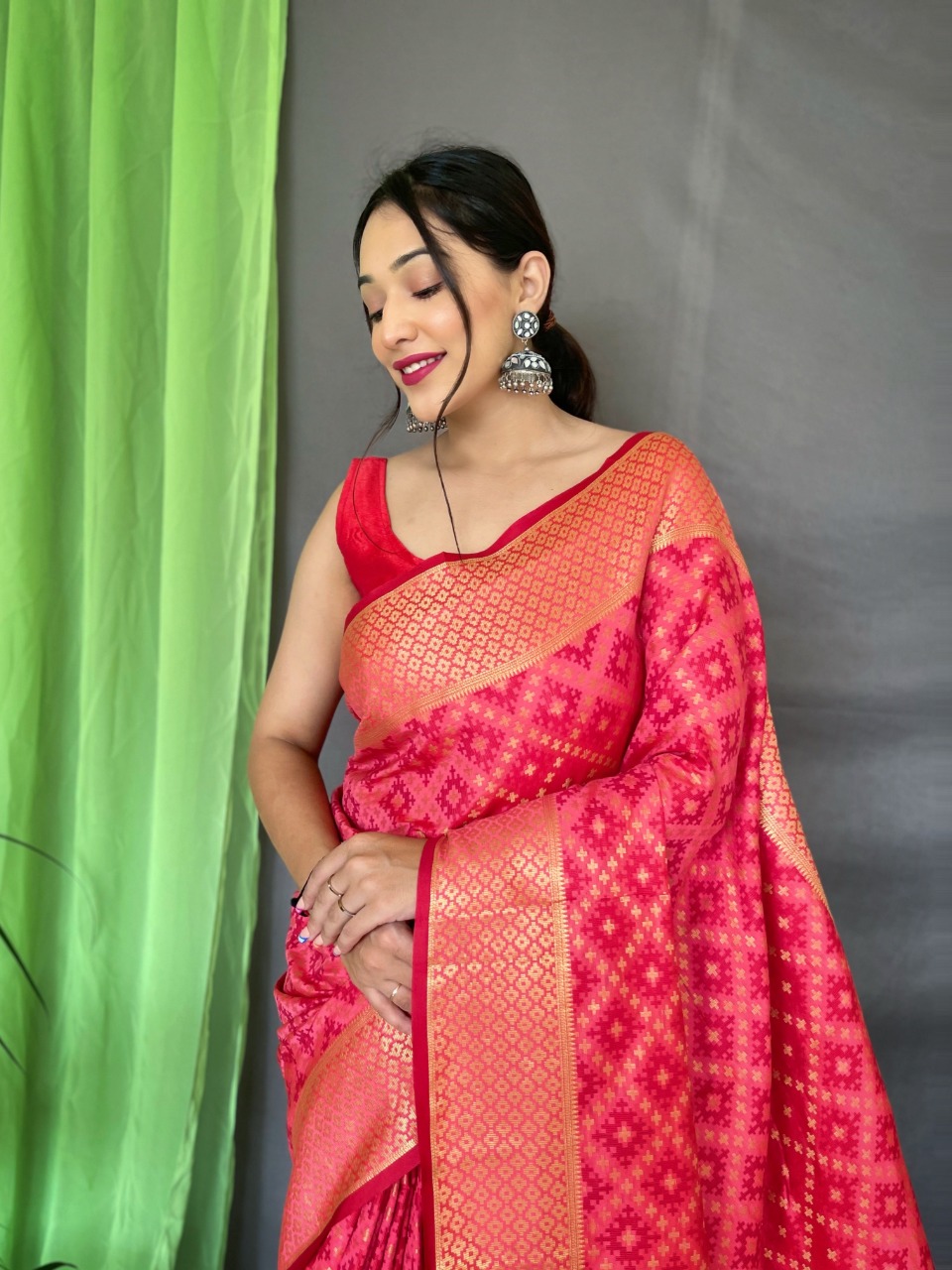 Gajari color patola silk saree with zari weaving work