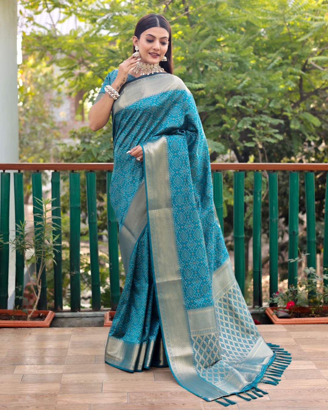 Firoji color patola silk saree with zari weaving work