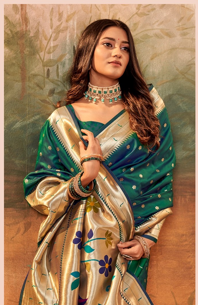 Rama green color paithani silk saree with zari weaving work