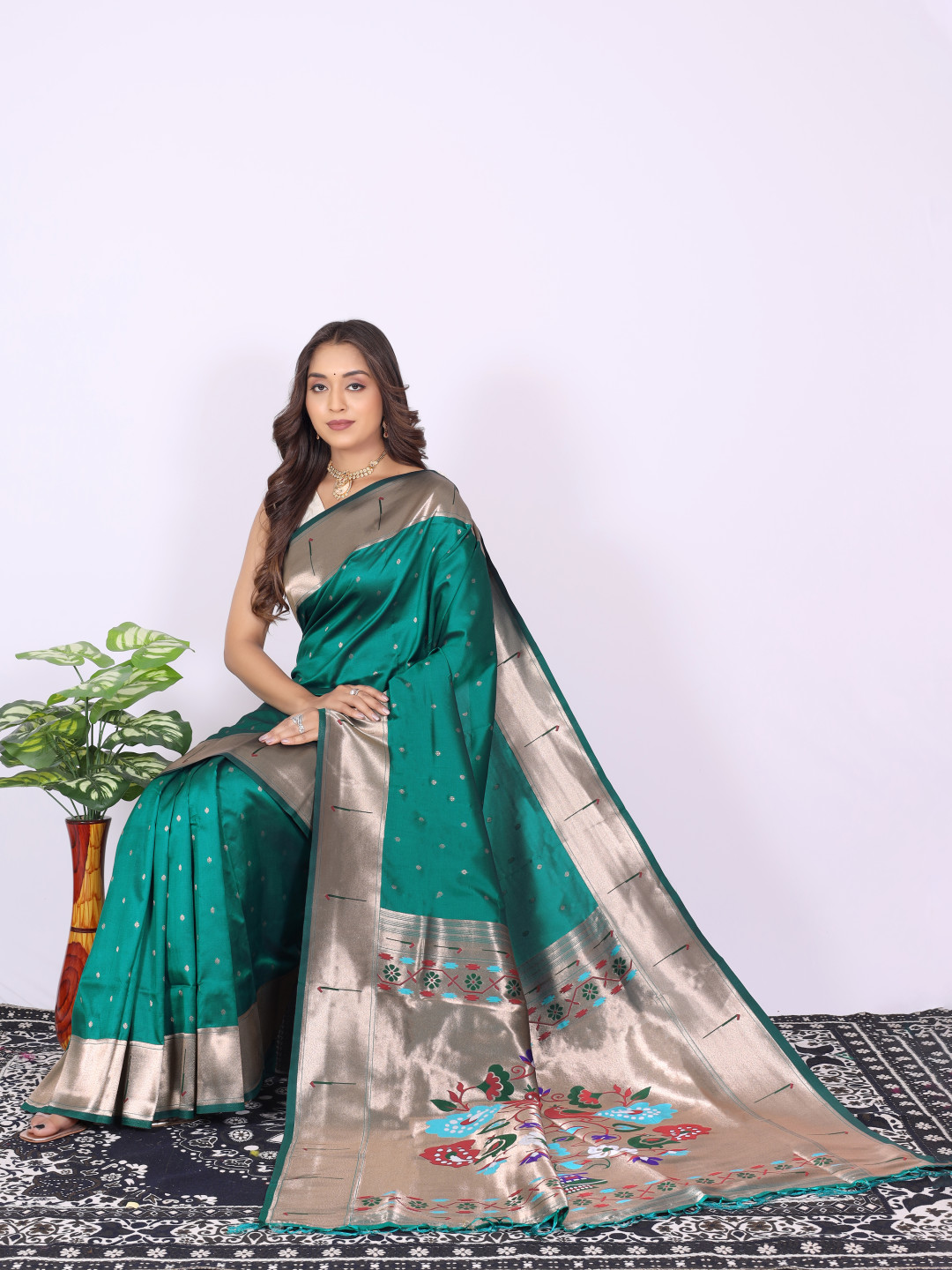 Rama green color paithani silk saree with zari weaving work