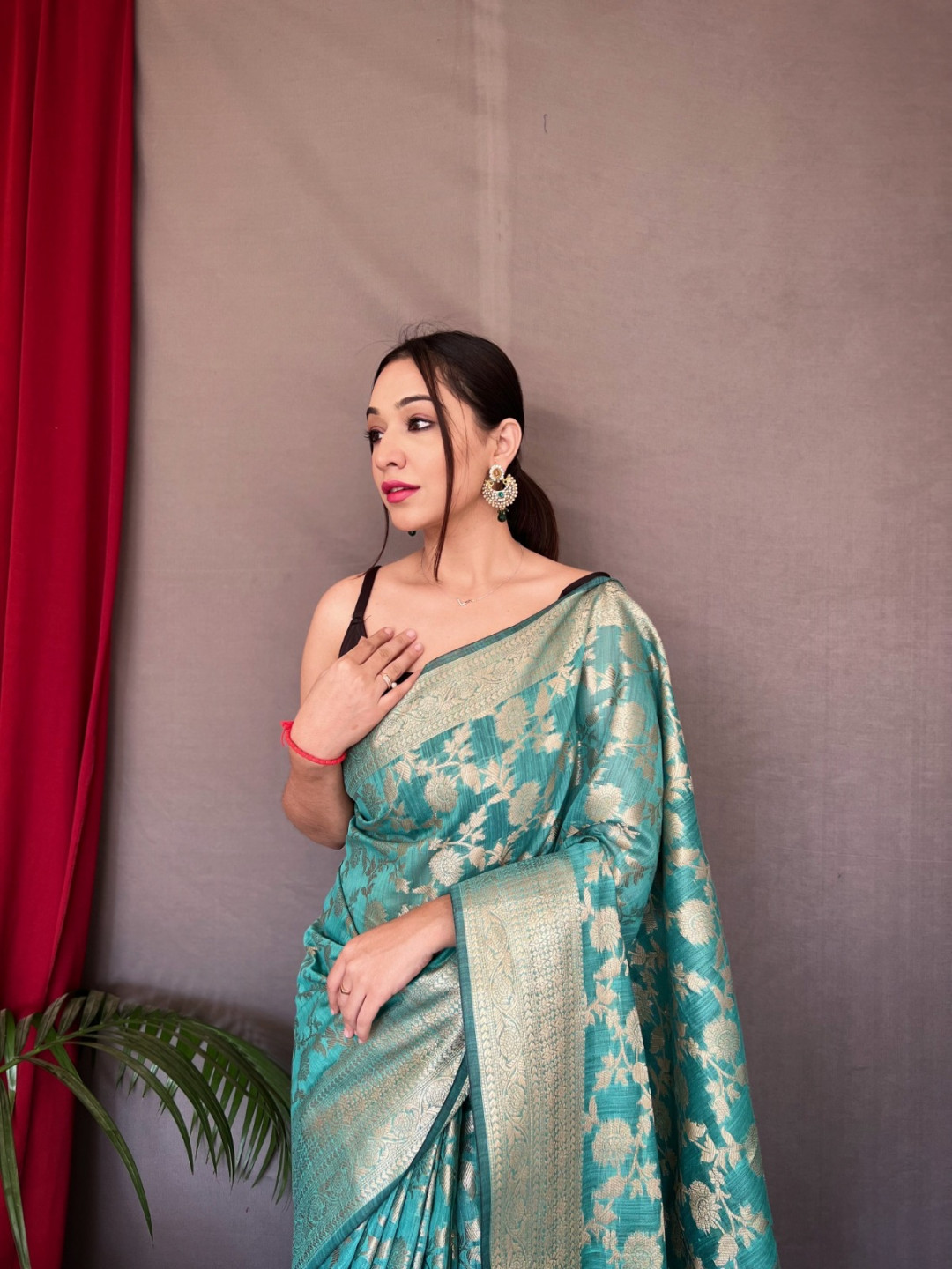 Rama green color linen silk saree with zari weaving work
