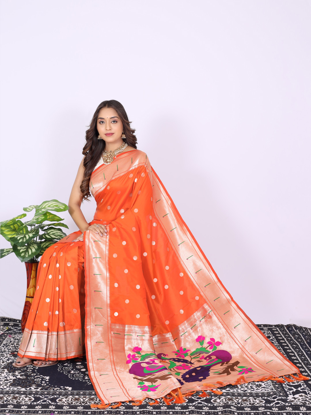 Orange color paithani silk saree with zari weaving work