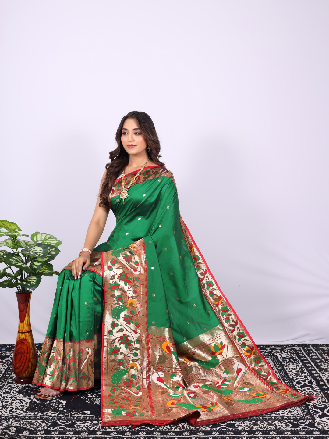 Green color paithani silk saree with zari woven work