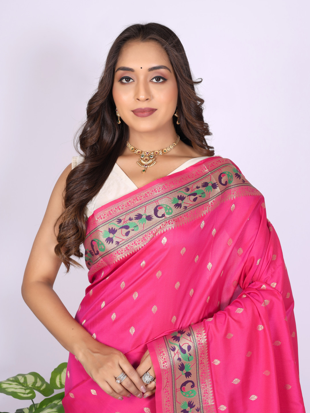 Rani pink color soft paithani silk saree with zari woven work