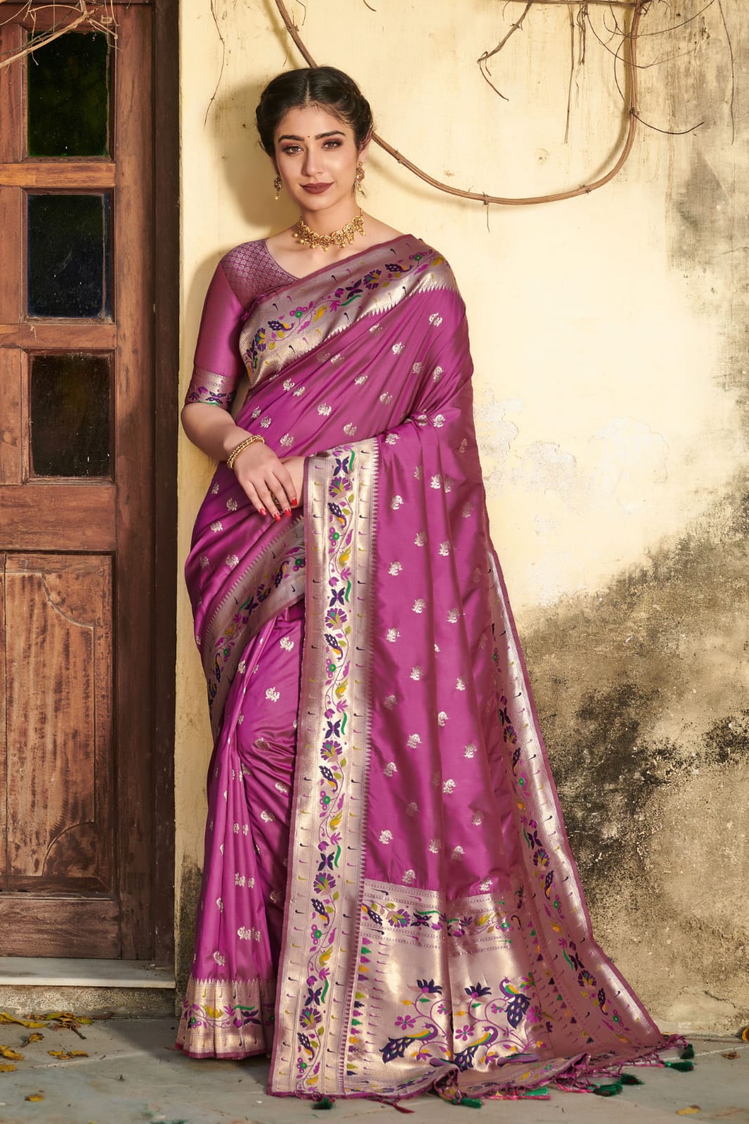 Magenta color paithani silk saree with zari woven work