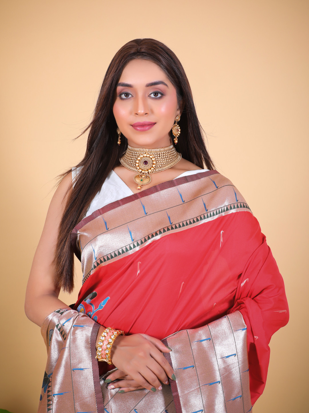 Red color paithani silk saree with zari weaving work