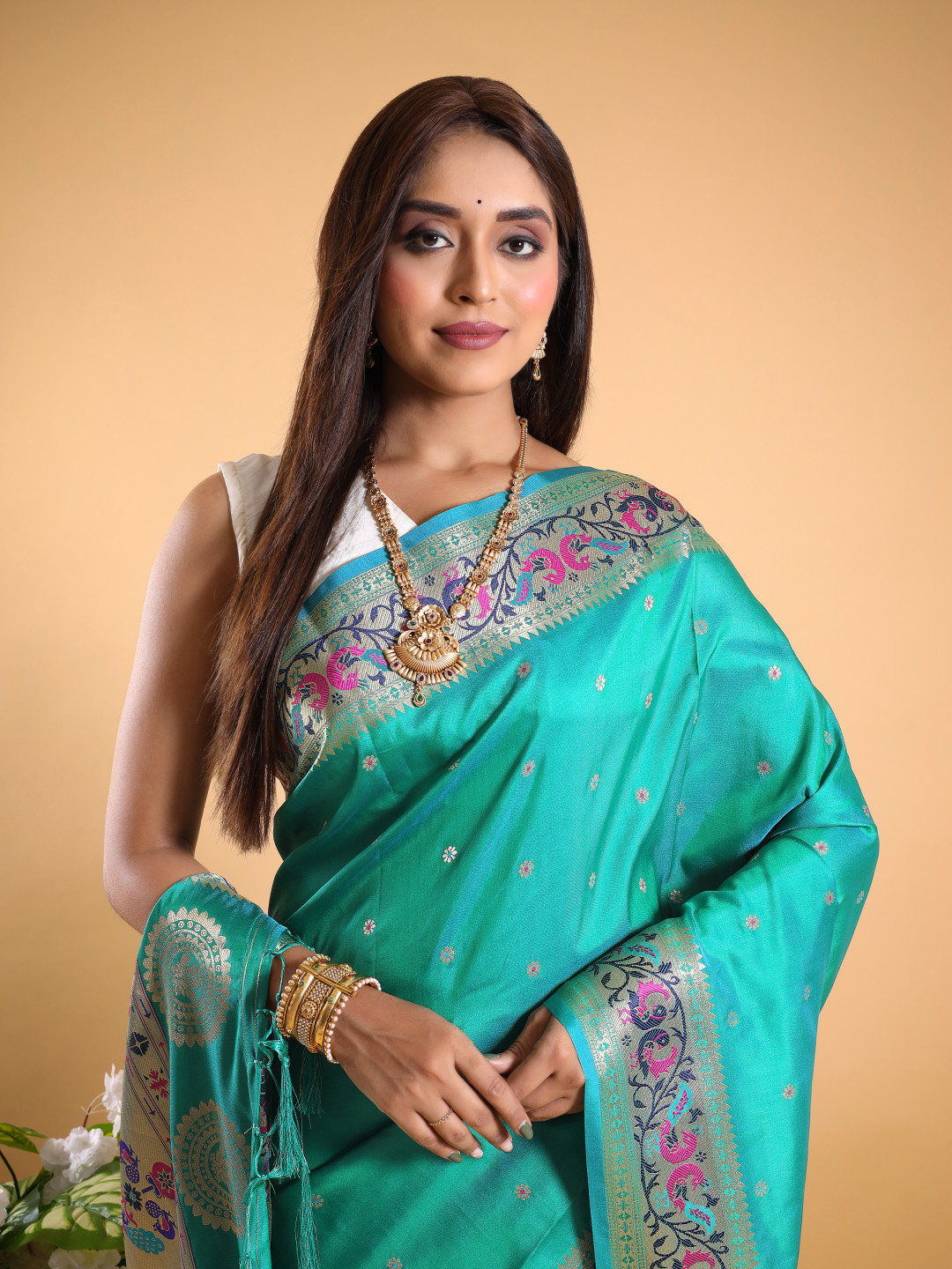 Rama green color paithani silk saree with zari weaving work