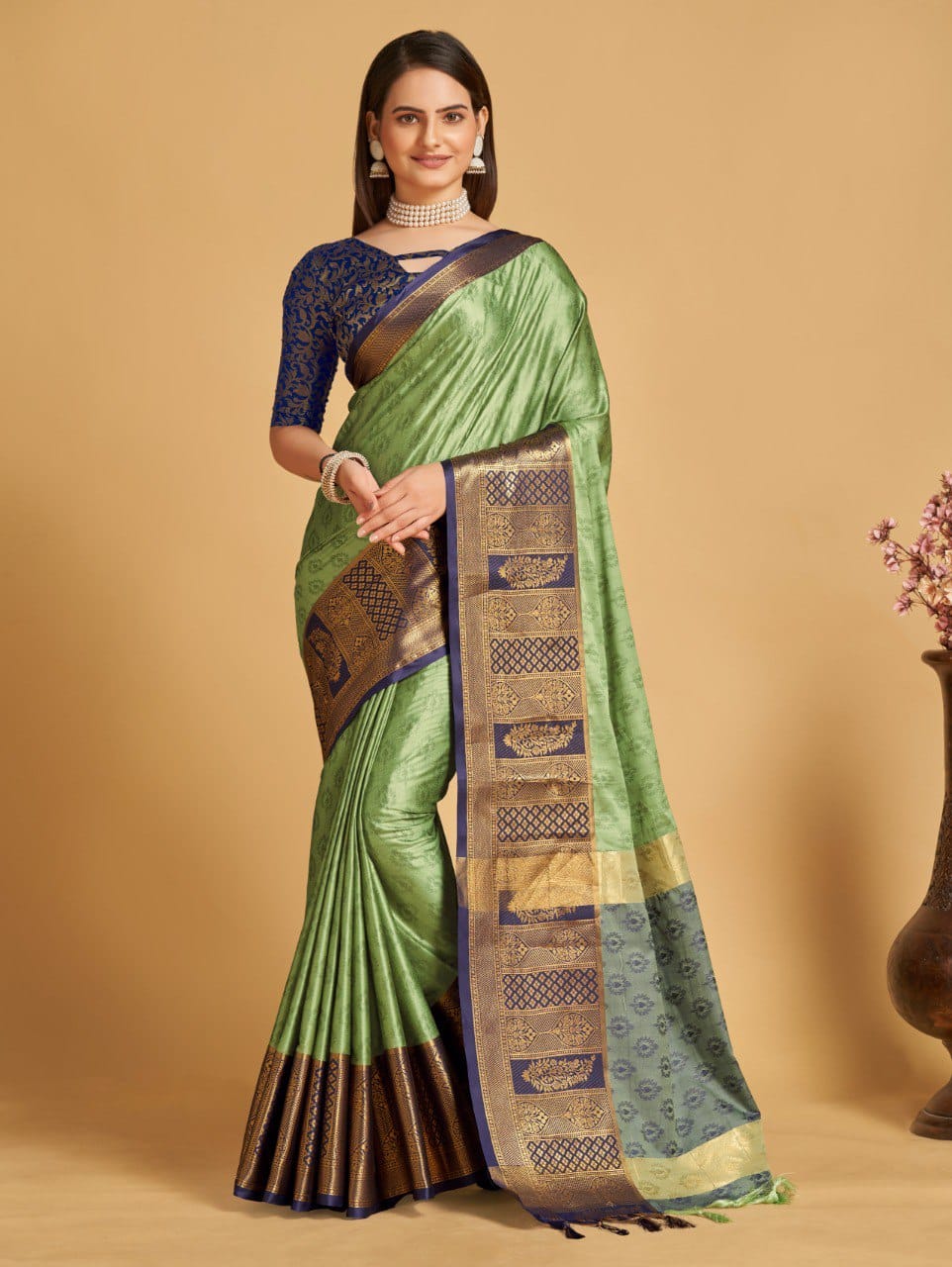 Light green color cotton silk saree with woven design
