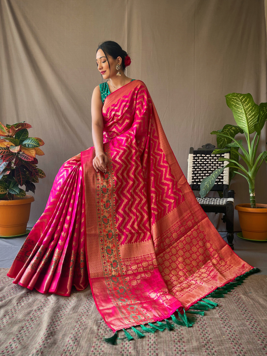 Rani pink color pure silk saree with golden zari weaving work