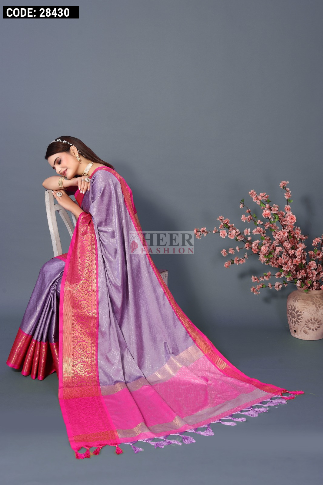 Lavender color soft cotton silk saree with woven design