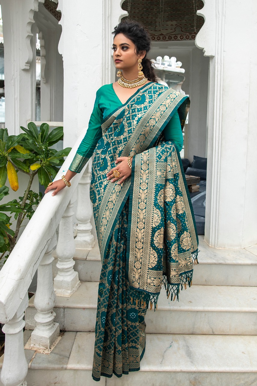 Rama green color bandhani saree with zari weaving work