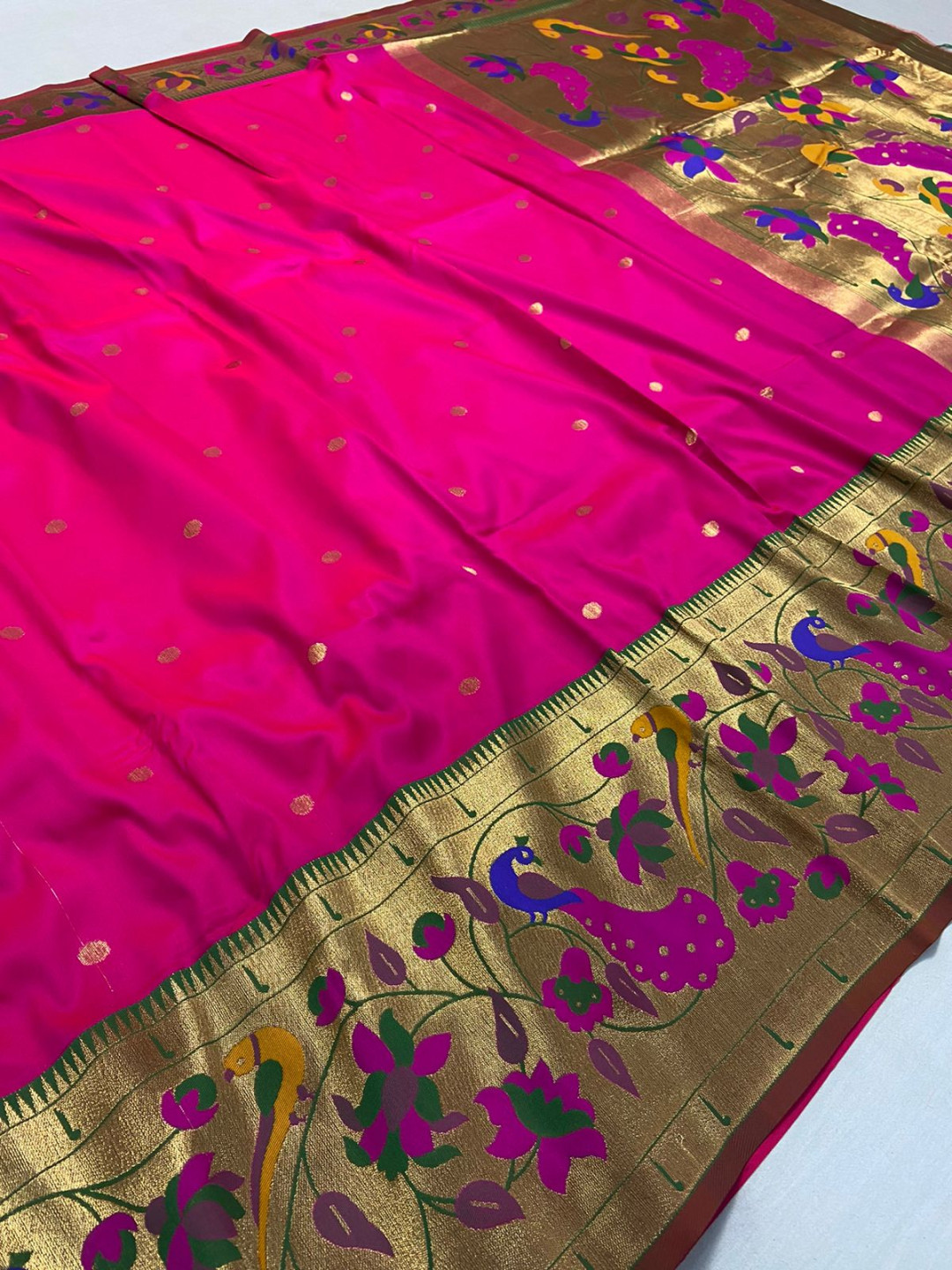 Rani pink color paithani silk saree with mina zari border