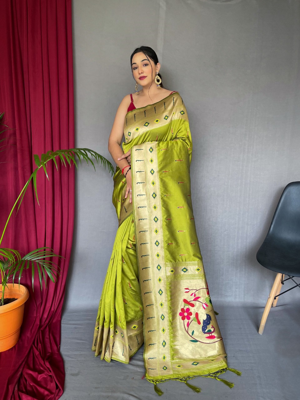 Mehndi green color paithani silk saree with zari weaving work