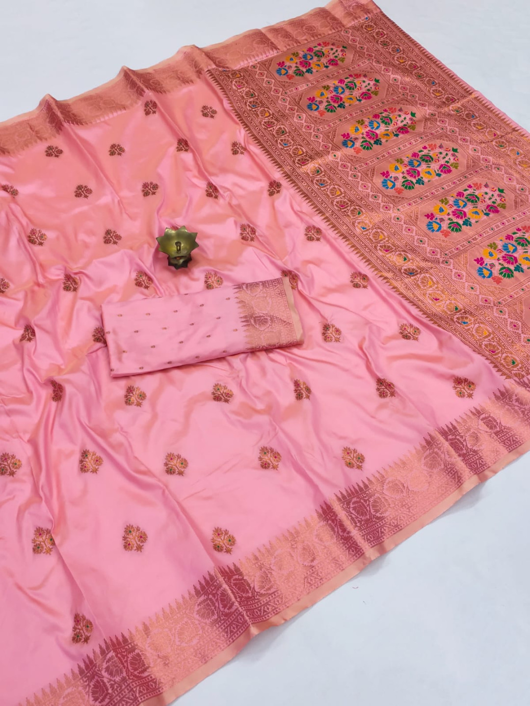 Baby pink color paithani silk saree with zari weaving work