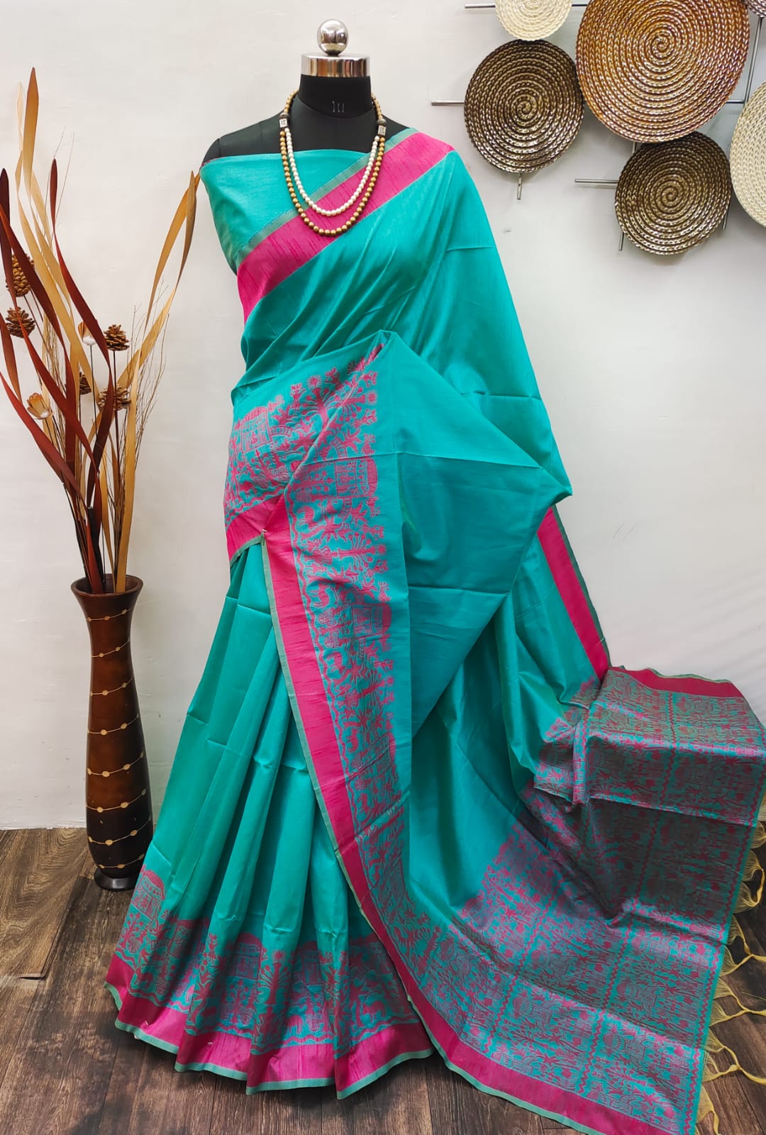 Rama green color raw silk saree with woven work