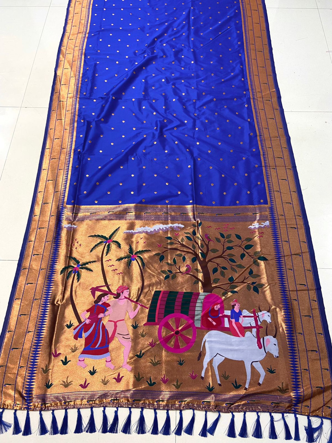 Royal blue color paithani silk saree with zari weaving work