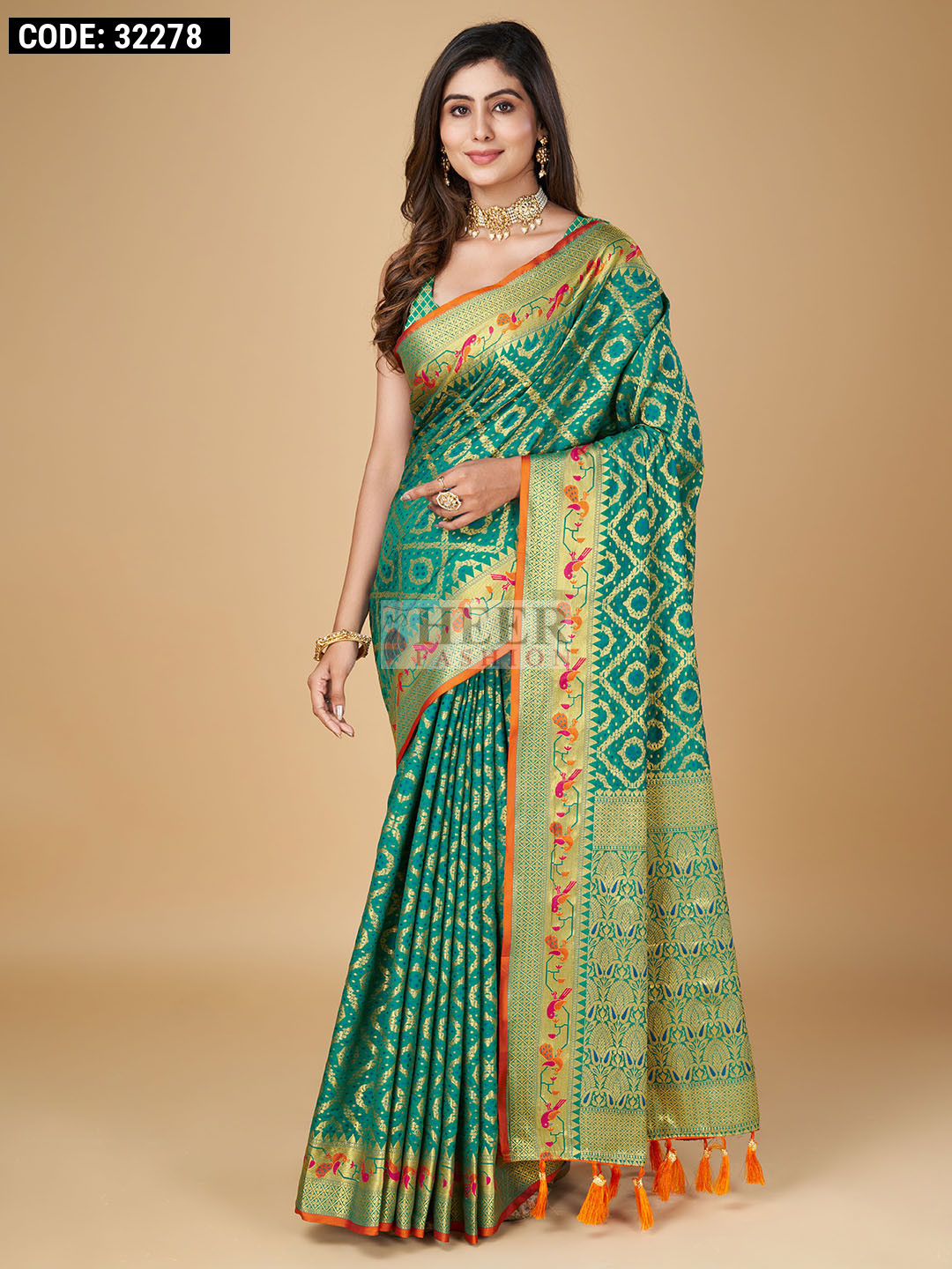 Rama green color patola silk saree with woven design